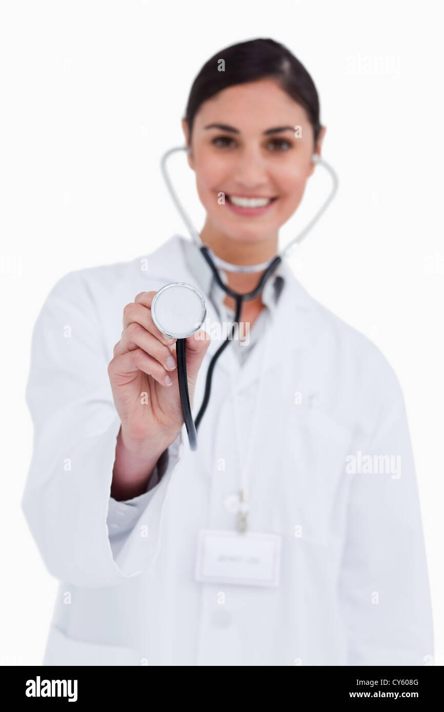 Stethoscope being used by smiling female doctor Stock Photo - Alamy