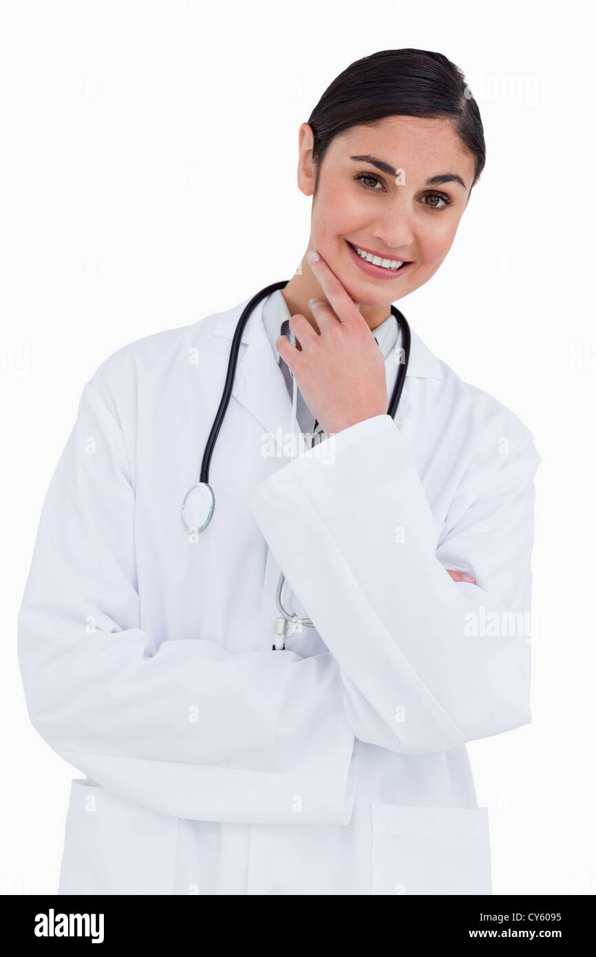 Smiling female doctor in thinkers pose Stock Photo - Alamy