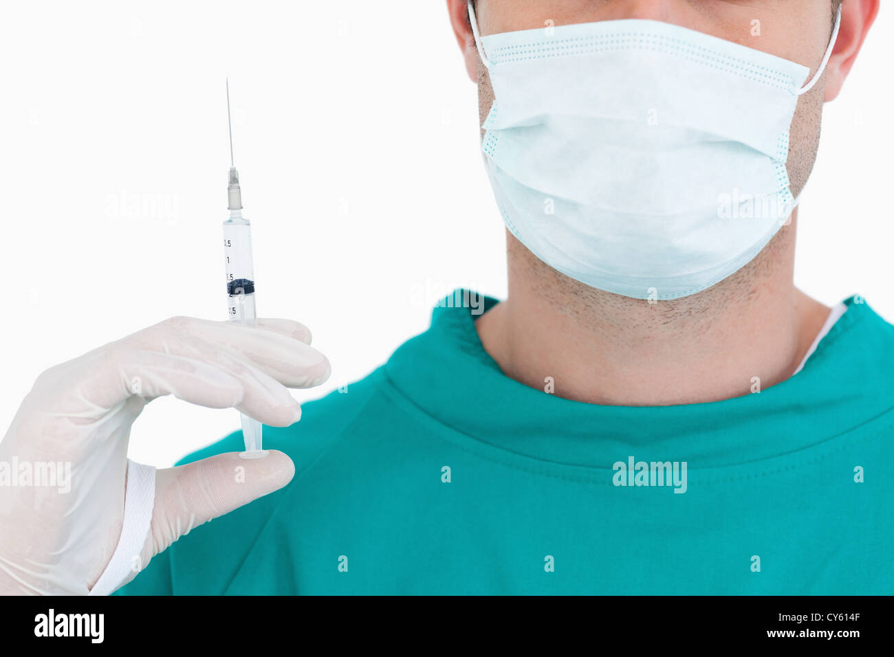 Close up of male doctor with syringe wearing scrubs Stock Photo - Alamy