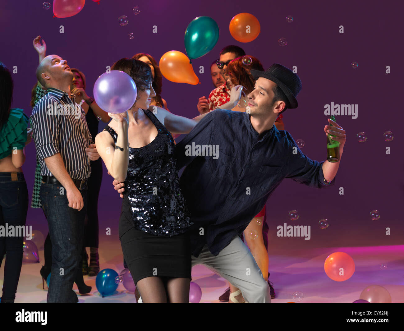 Guy dancing in front of girl hi-res stock photography and images - Alamy