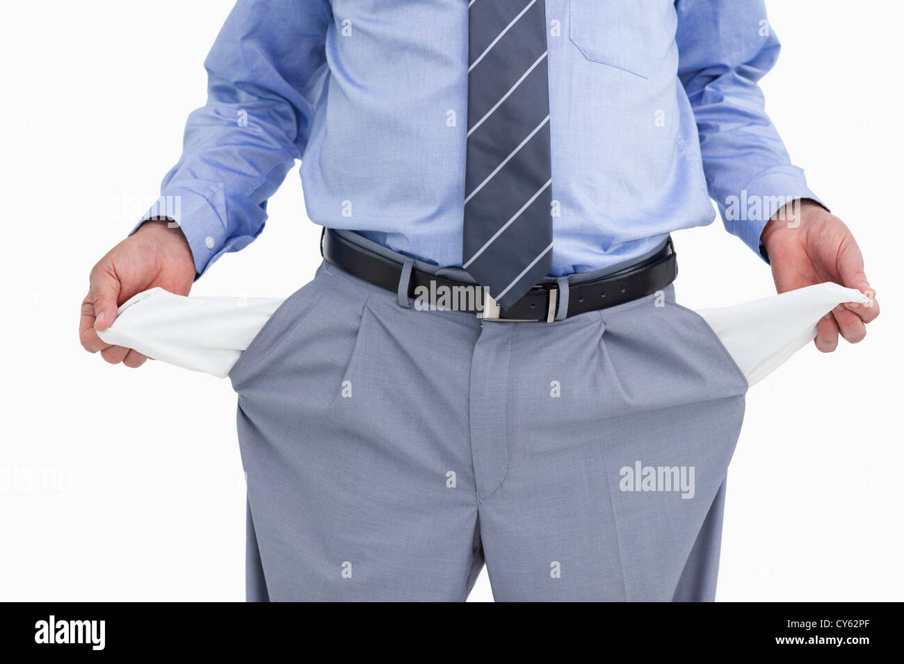 Empty pockets of tradesman being shown Stock Photo - Alamy