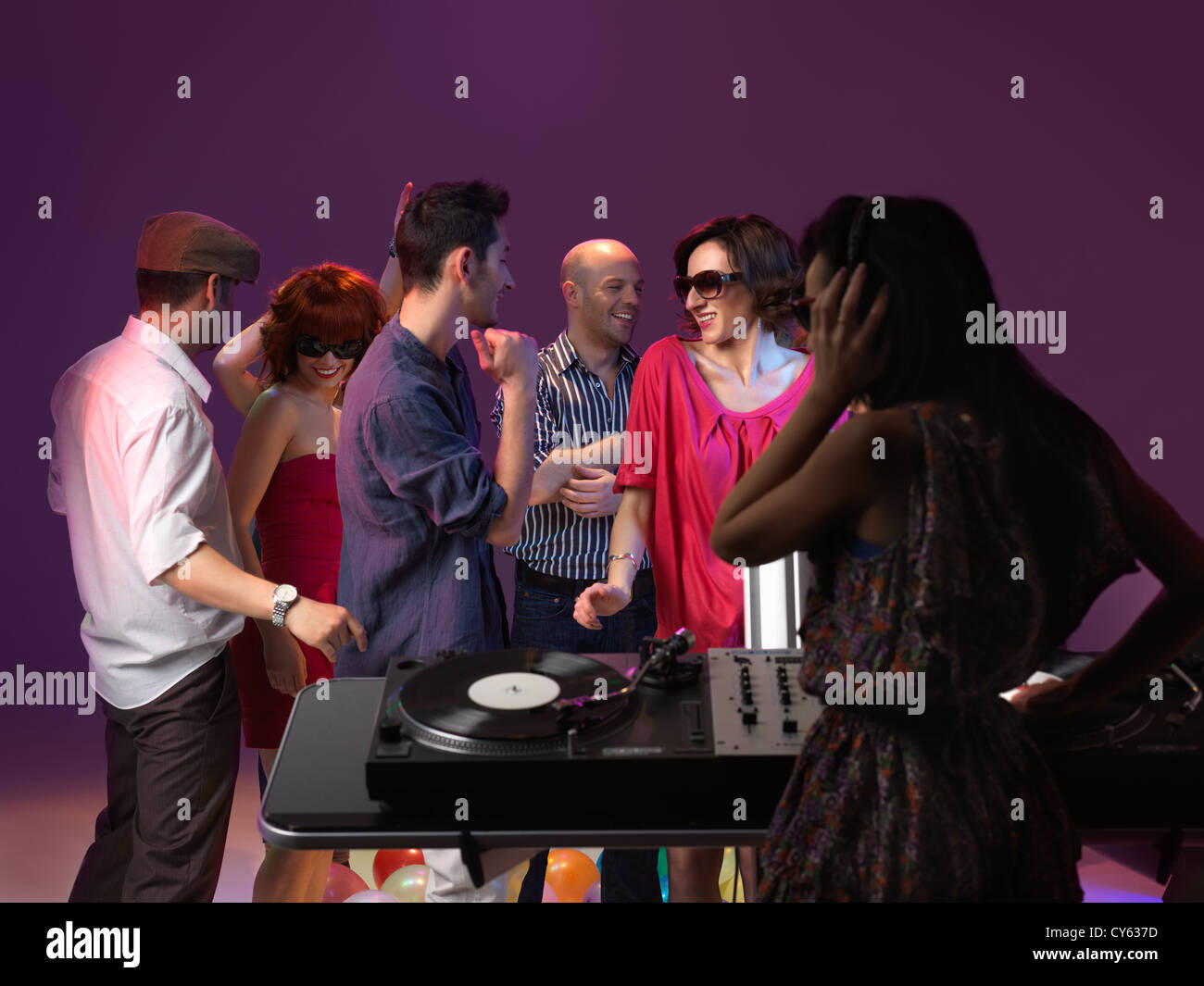 young people dancing and smiling, with dj mixing Stock Photo - Alamy