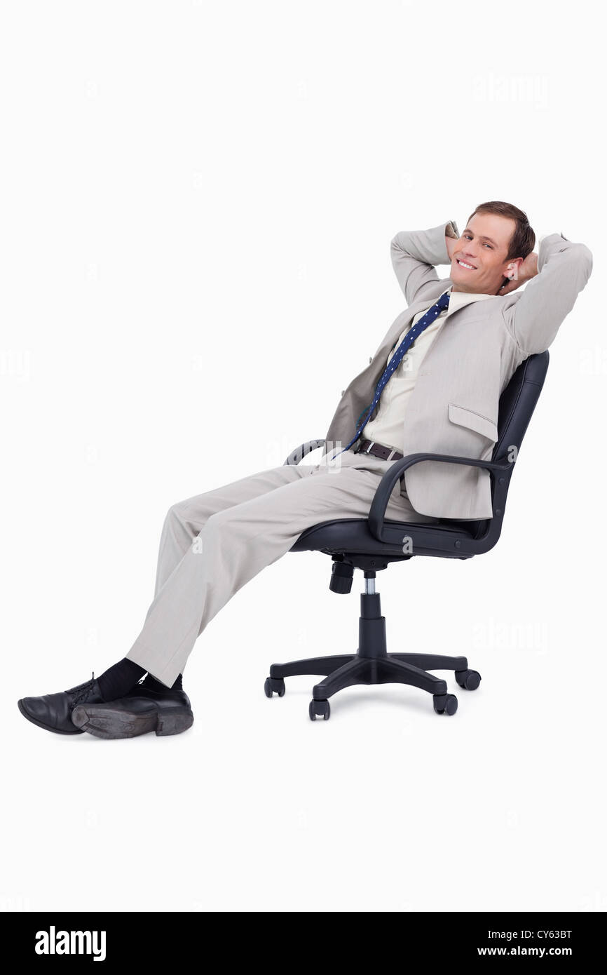 Leaning back in chair Cut Out Stock Images & Pictures - Alamy