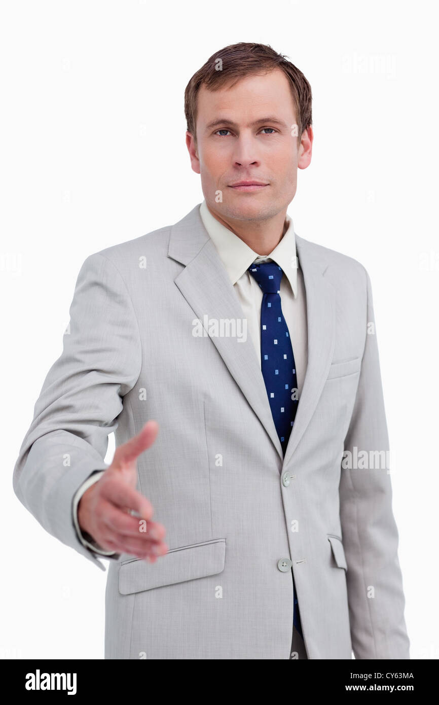 Businessman offering his hand Stock Photo - Alamy