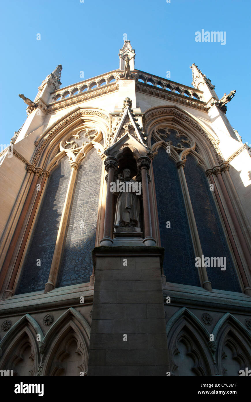 Close up of a statue on the exterior of the apse of St John's College ...