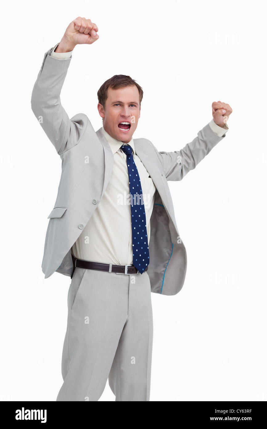Celebrating businessman with his arms up Stock Photo - Alamy