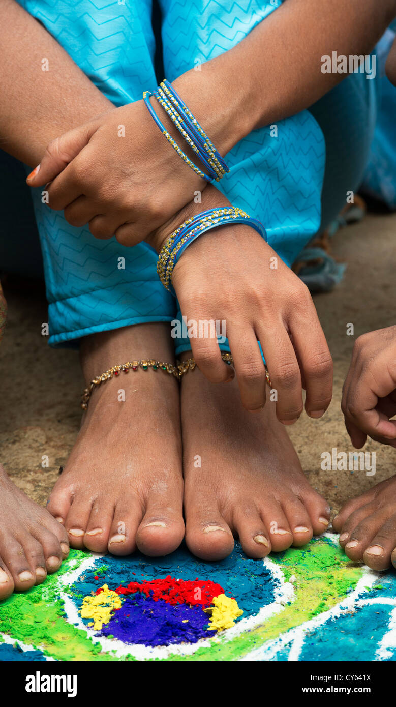 Indian Girls Bare Feet Around A Indian Rangoli Peacock Festival Design