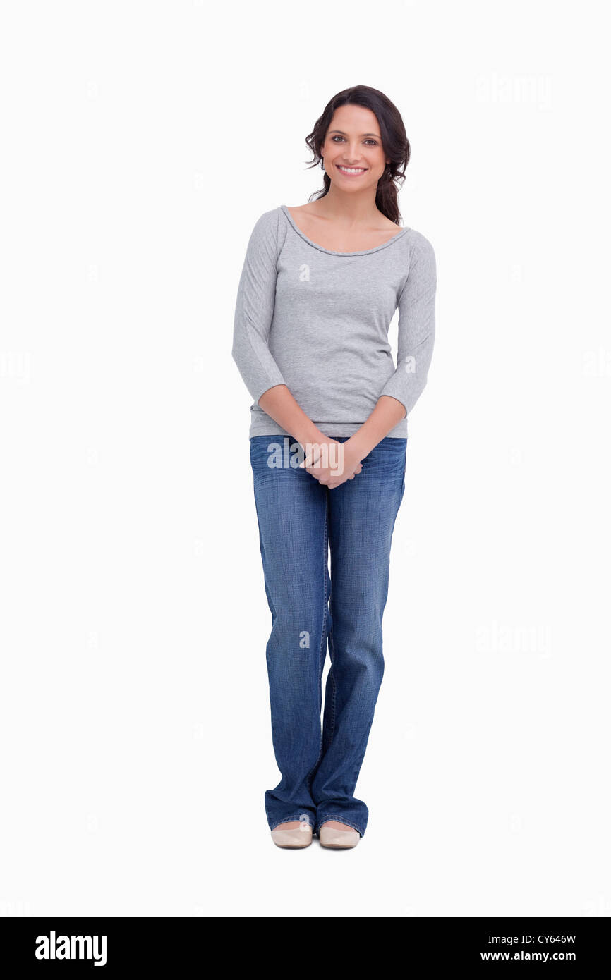 Confident woman jeans standing Cut Out Stock Images & Pictures - Alamy