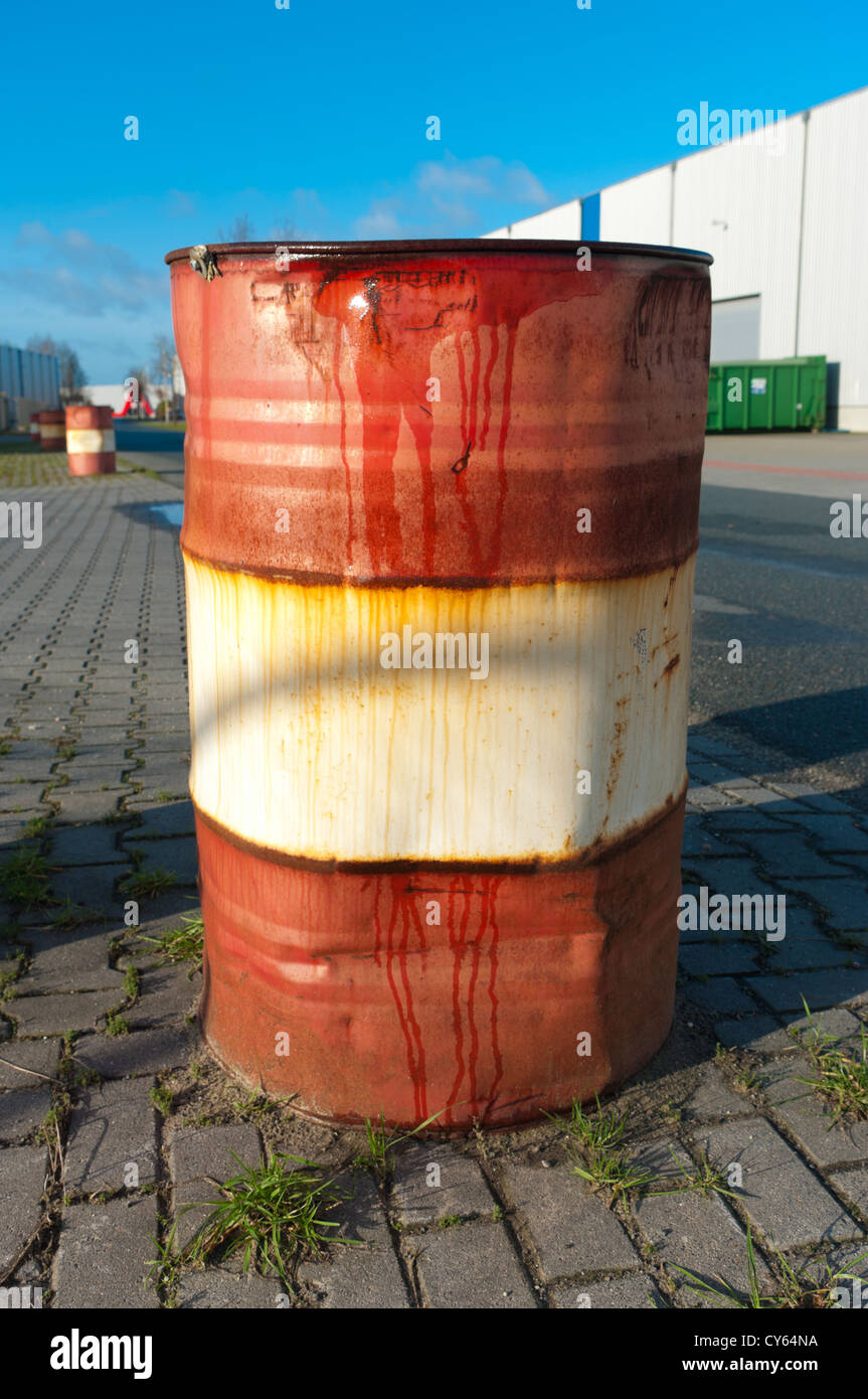 old rusty oil barrel on an industrial area Stock Photo - Alamy