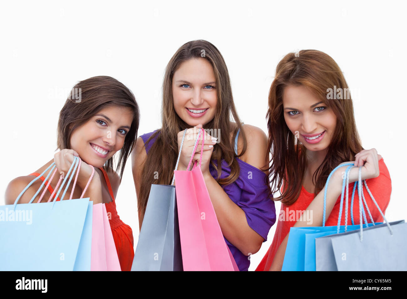 Teenage girls proudly coming back from shopping Stock Photo - Alamy