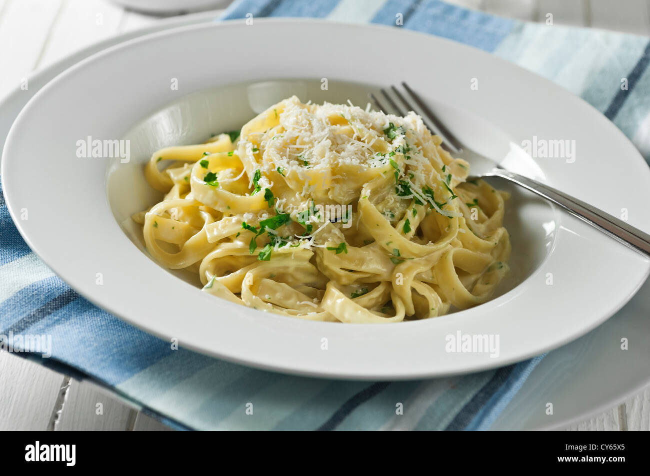 Fettucine Alfredo Pasta and cheese dish Stock Photo - Alamy