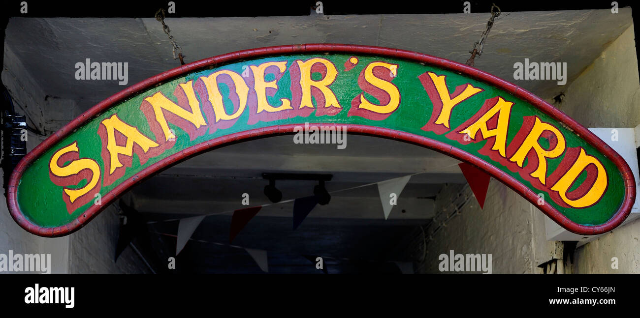 A curved sign with Sander`s Yard hand written onto it Stock Photo - Alamy