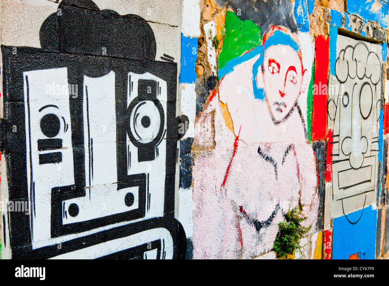 Graffiti artwork on walls in the back streets a Faro Stock Photo - Alamy