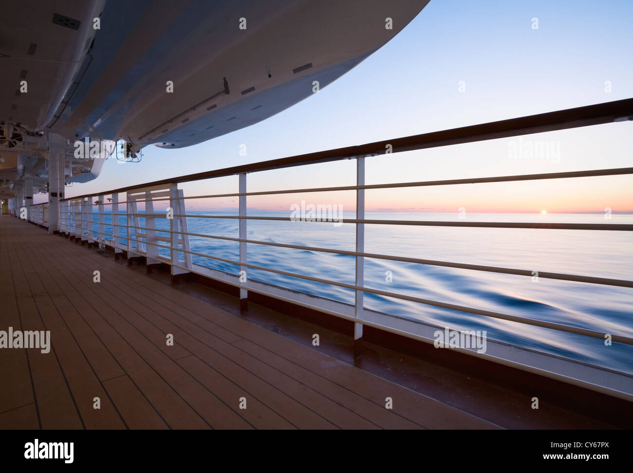 Cruise Ship Promenade Deck at Sunset Stock Photo - Alamy
