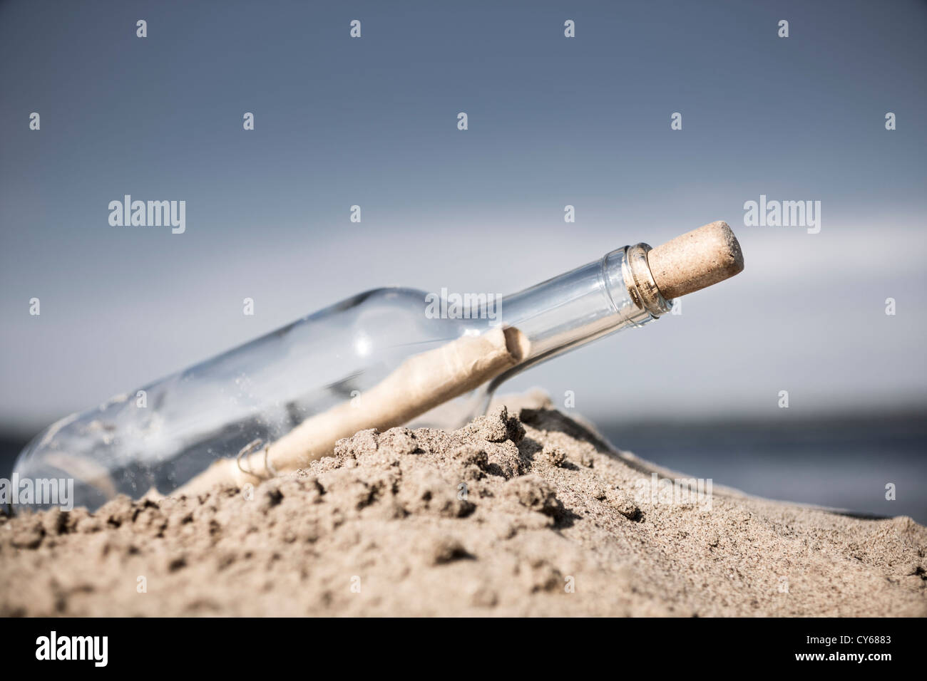 glass bottle with note washed up on the beach Stock Photo - Alamy
