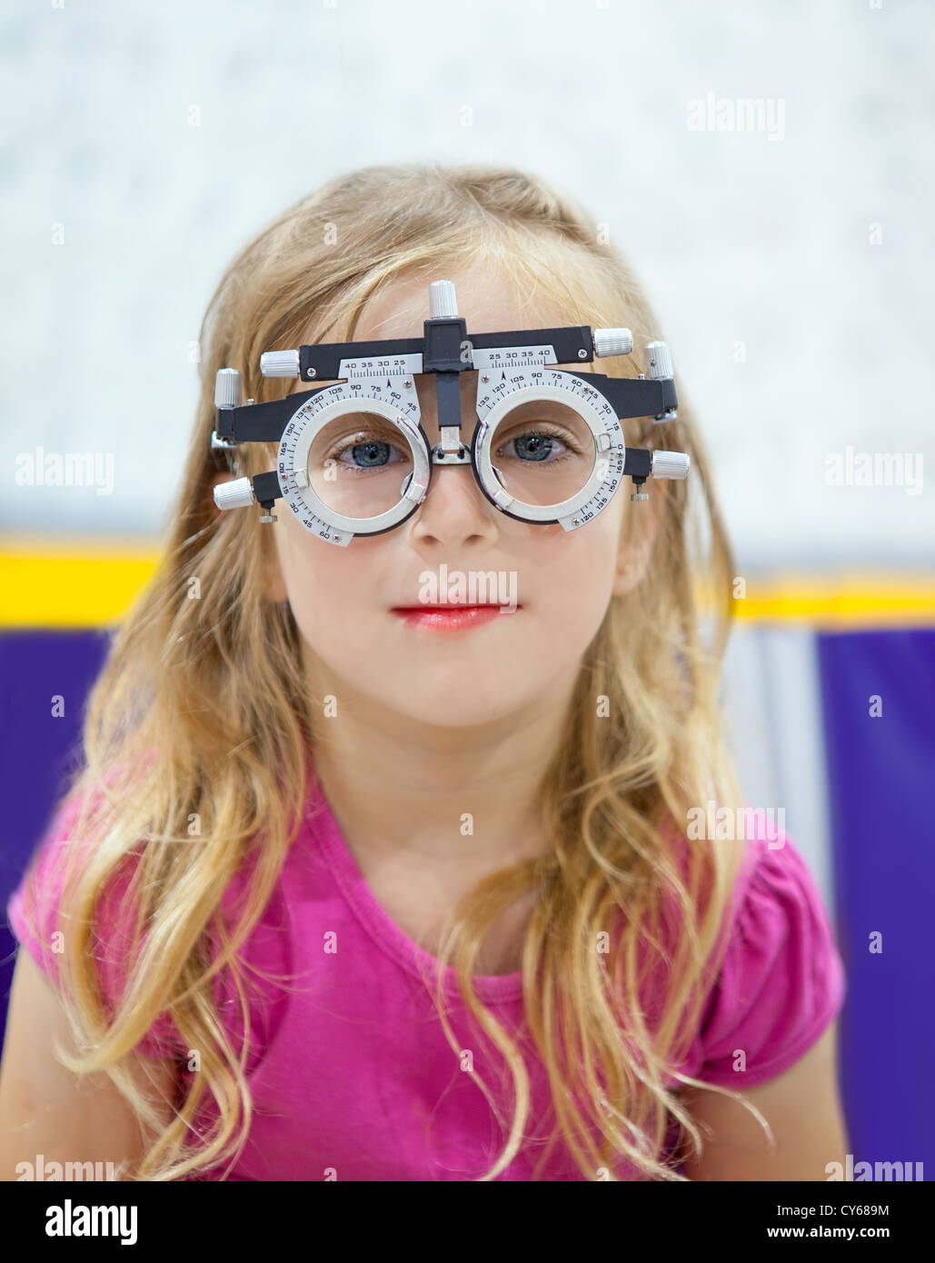 blond children girl with optometrist diopter glasses smiling Stock ...