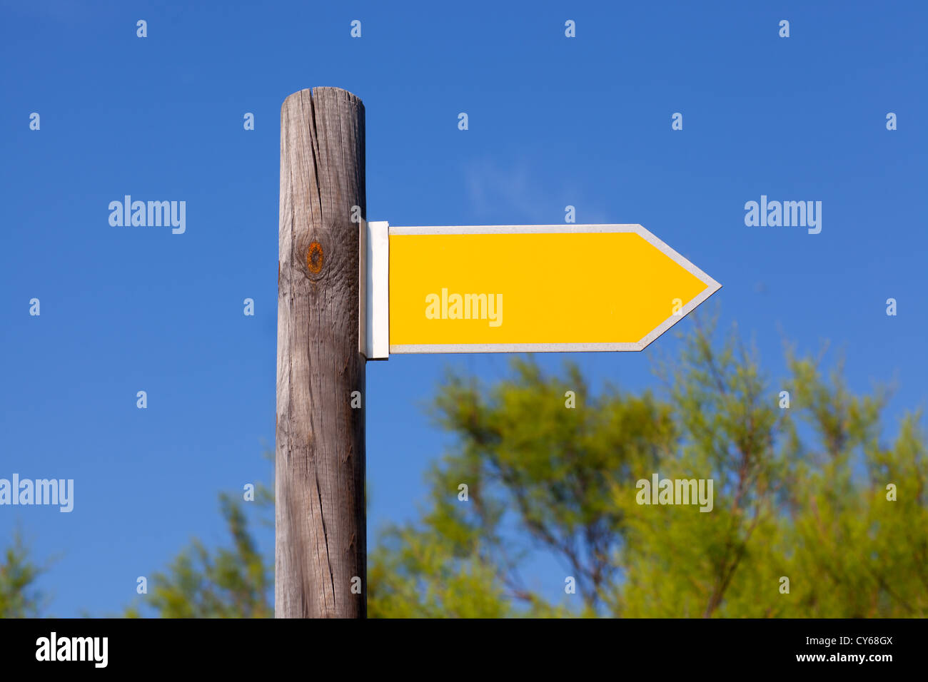 Direction sign on wooden pole hi-res stock photography and images - Alamy