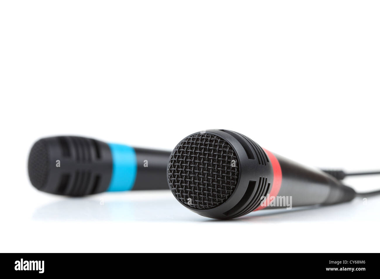 Two cable microphones. Isolated on white background, small DOF Stock ...