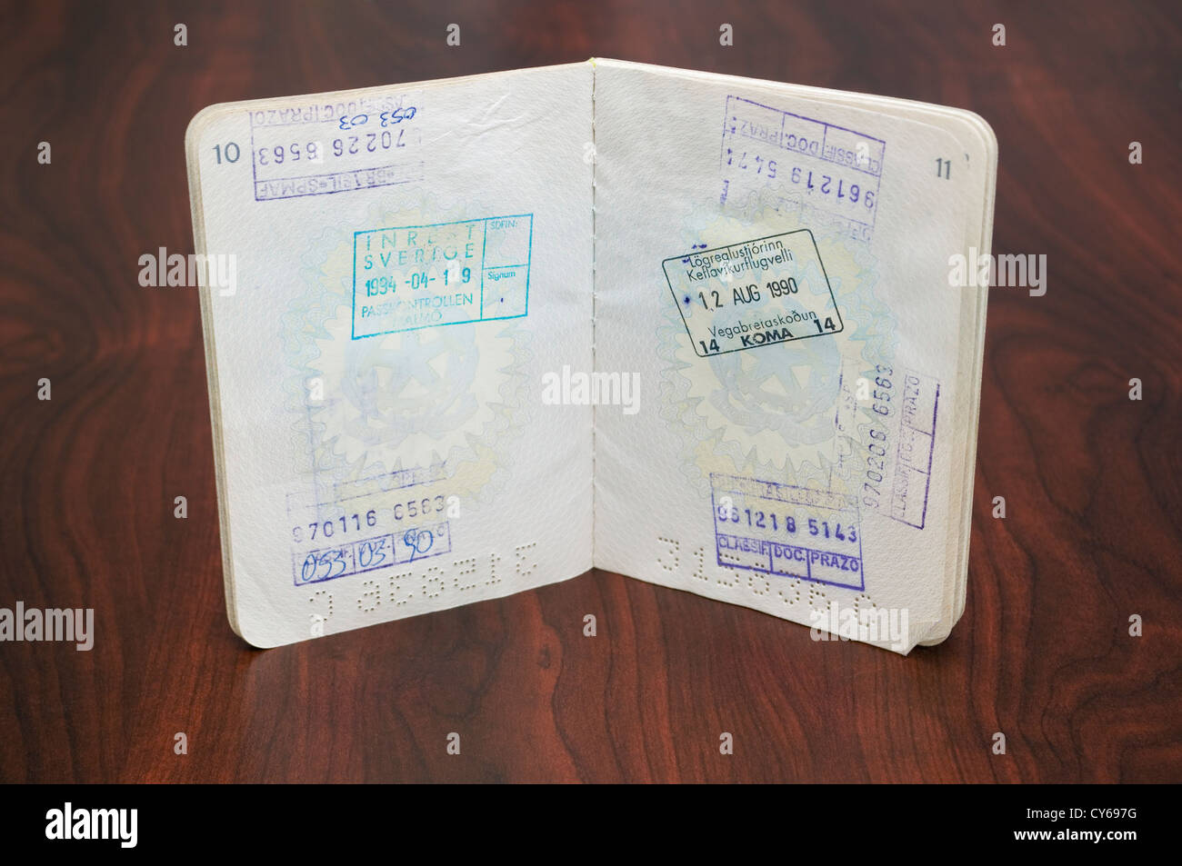 Open Passport with Stamps Stock Photo - Alamy