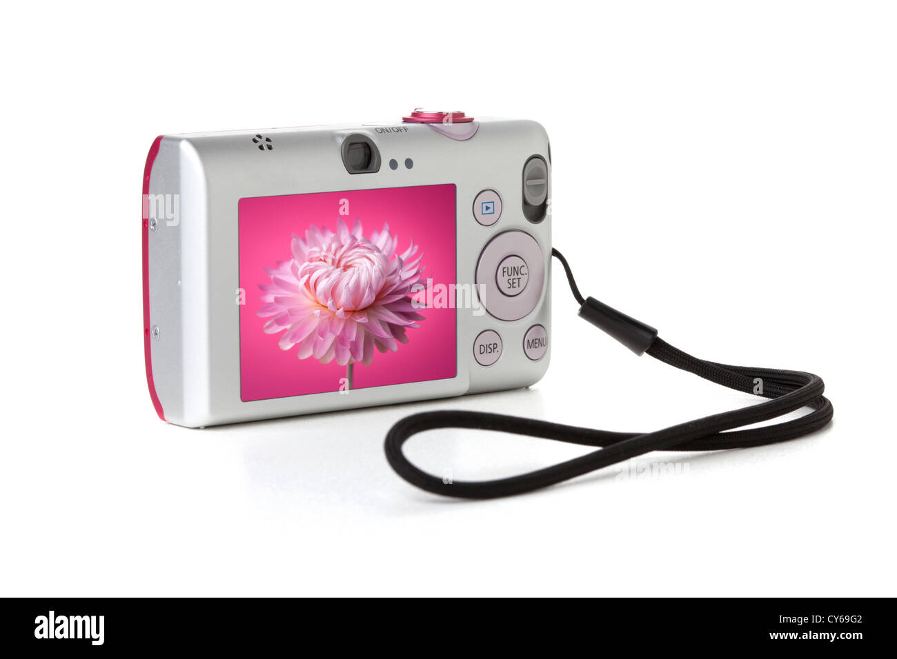 Compact digital camera with pink flower on display. Isolated on white ...