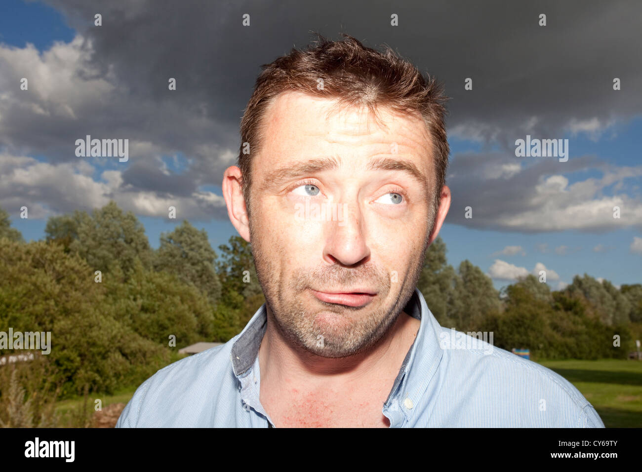 male pulling a funny face Stock Photo - Alamy