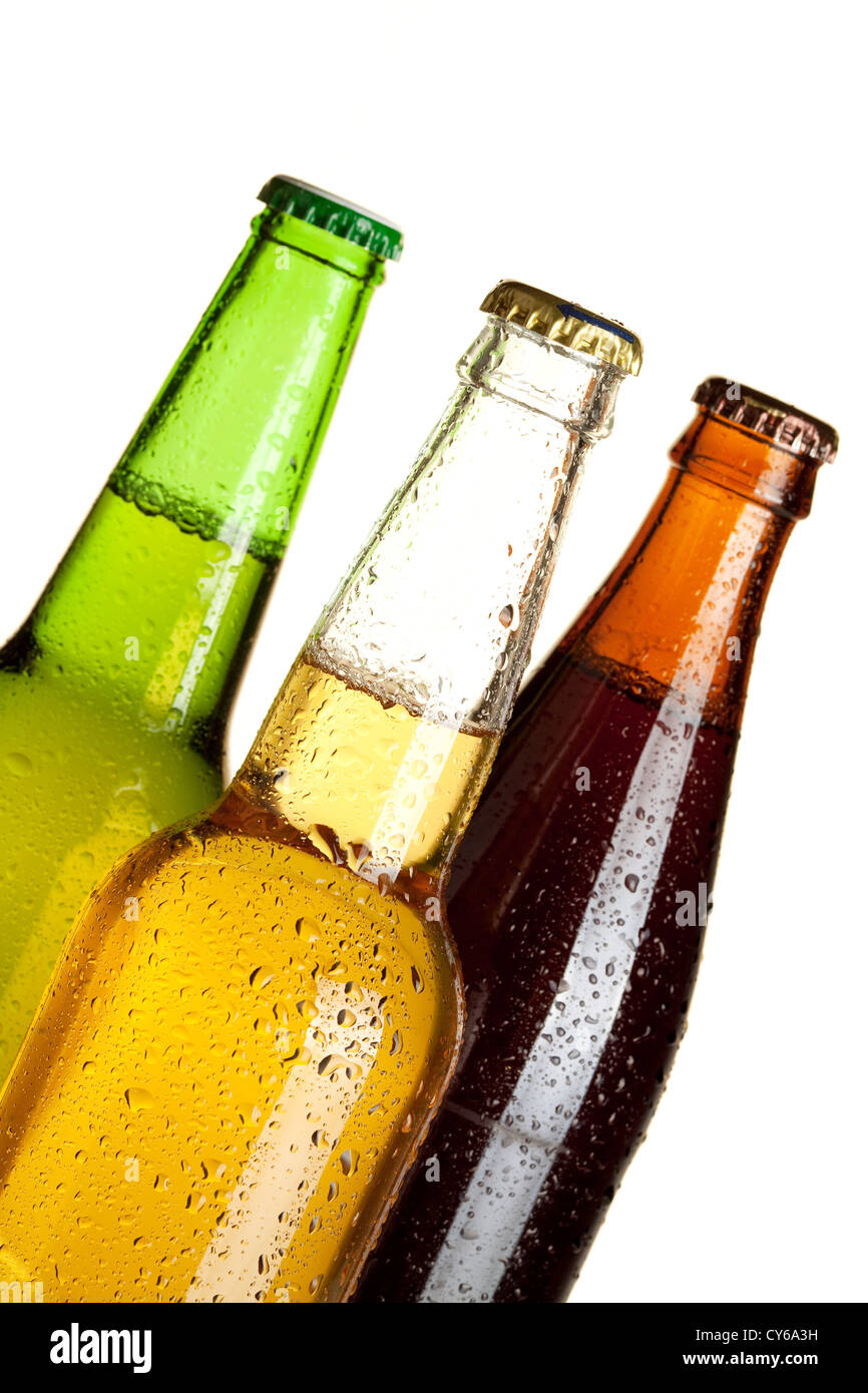 Beer collection - Three beer bottles. Closeup, isolated on white ...