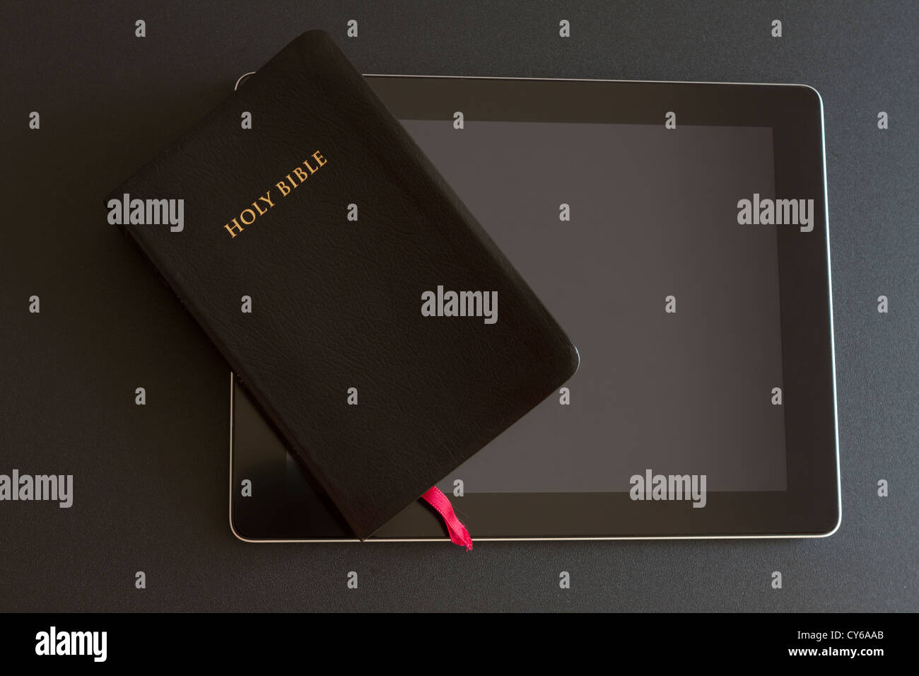 The Holy Bible on Tablet Pc Stock Photo - Alamy