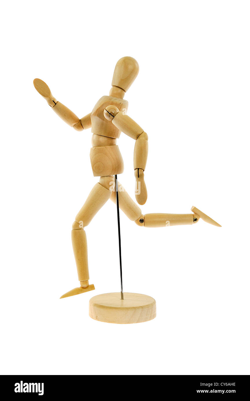 Wooden figure running isolated on white background Stock Photo - Alamy