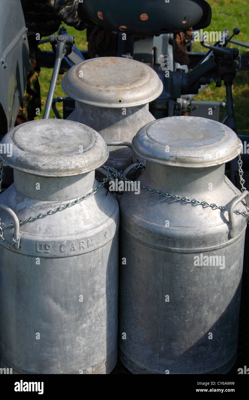 milk churns on a tractor Stock Photo - Alamy