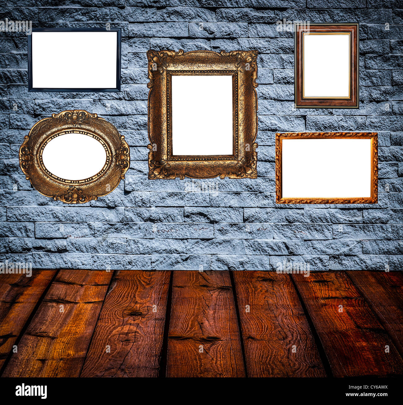 Retro room with antique picture frames on stone wall Stock Photo - Alamy