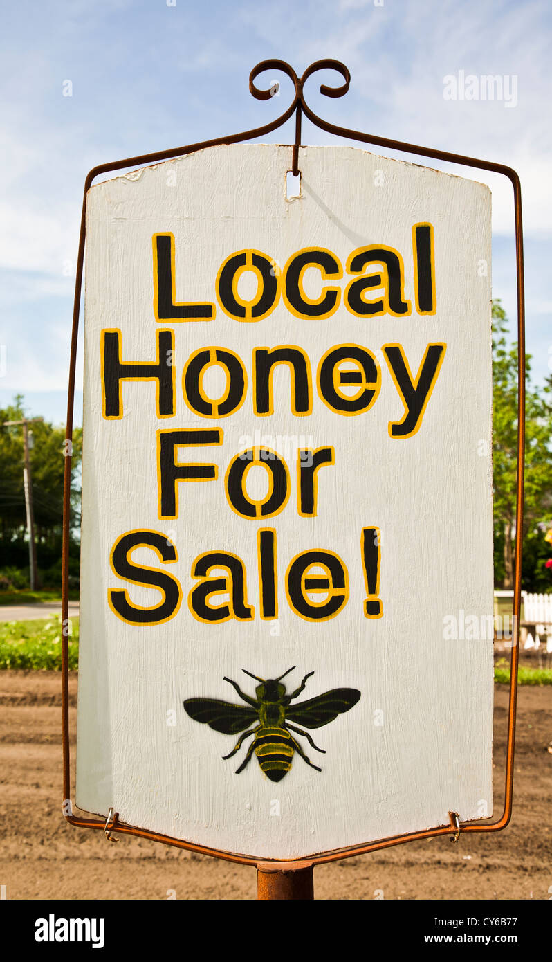 Close up of a retro Honey for sale sign at a rural farm in Freehold Twp ...