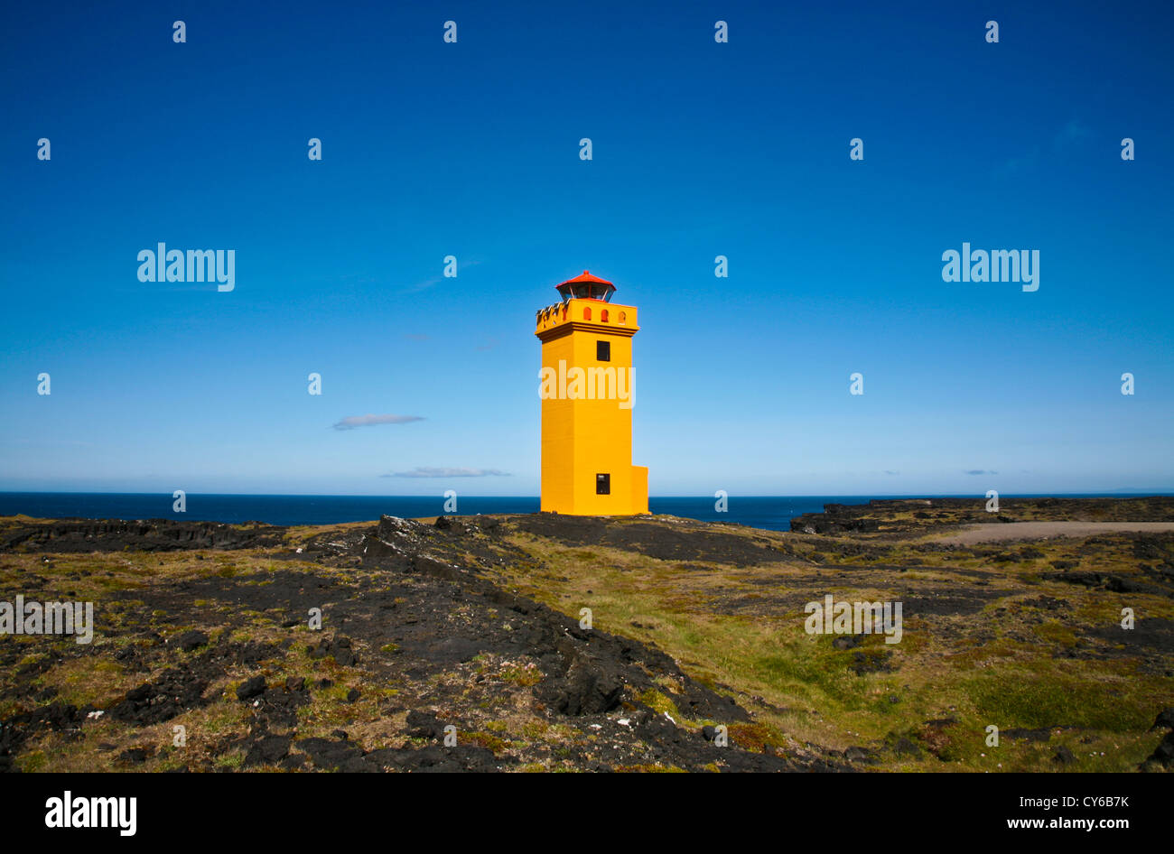 Svortuloft lighthouse on the coast of Snaefellsnes Peninsula, yellow ...