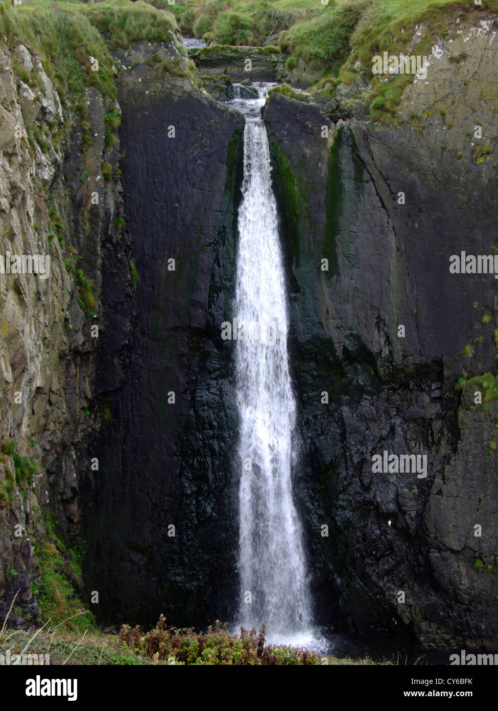 A view of the waterfall at Hartland Quay Devon UK Stock Photo - Alamy