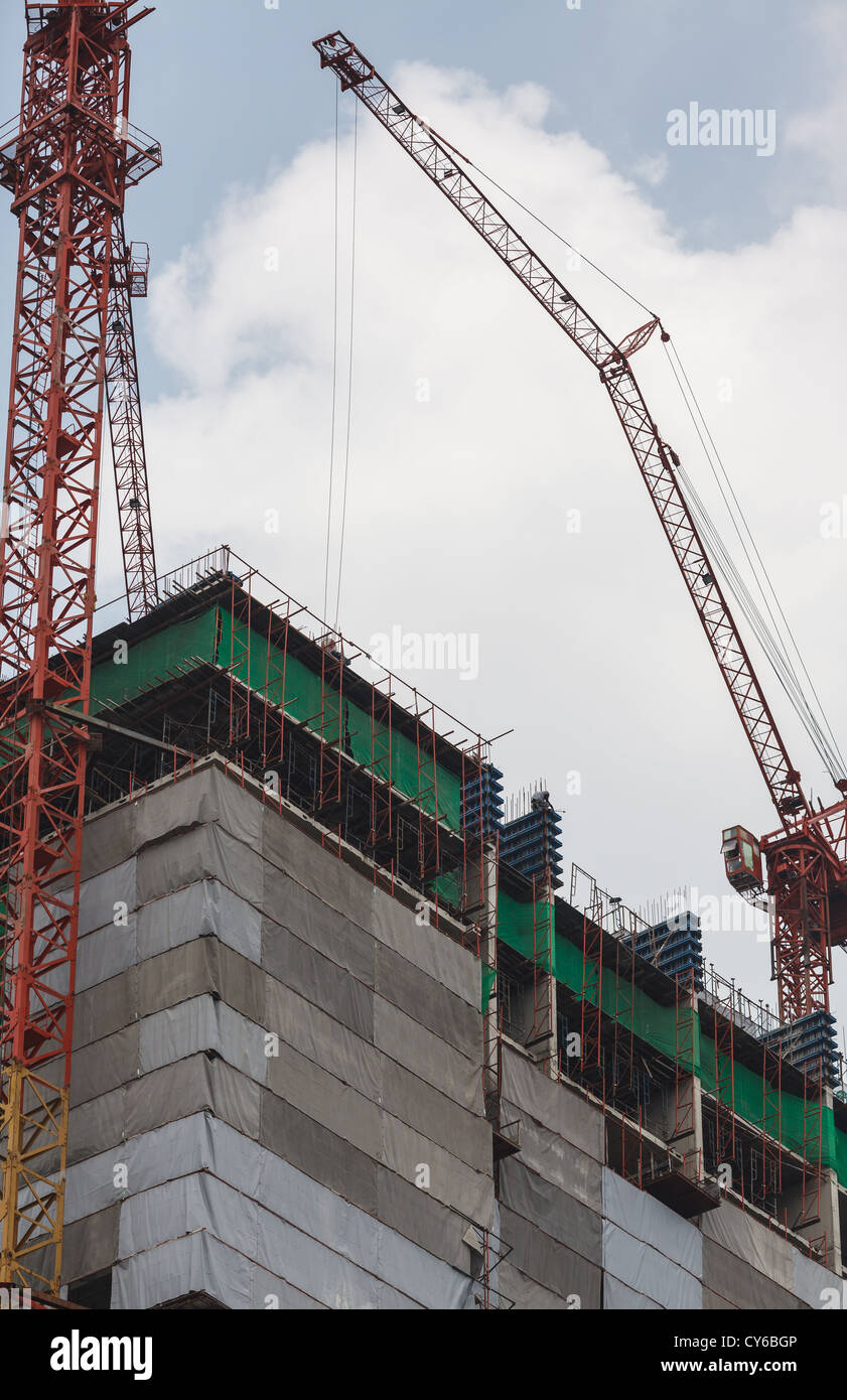 Construction site with crane and building Stock Photo - Alamy