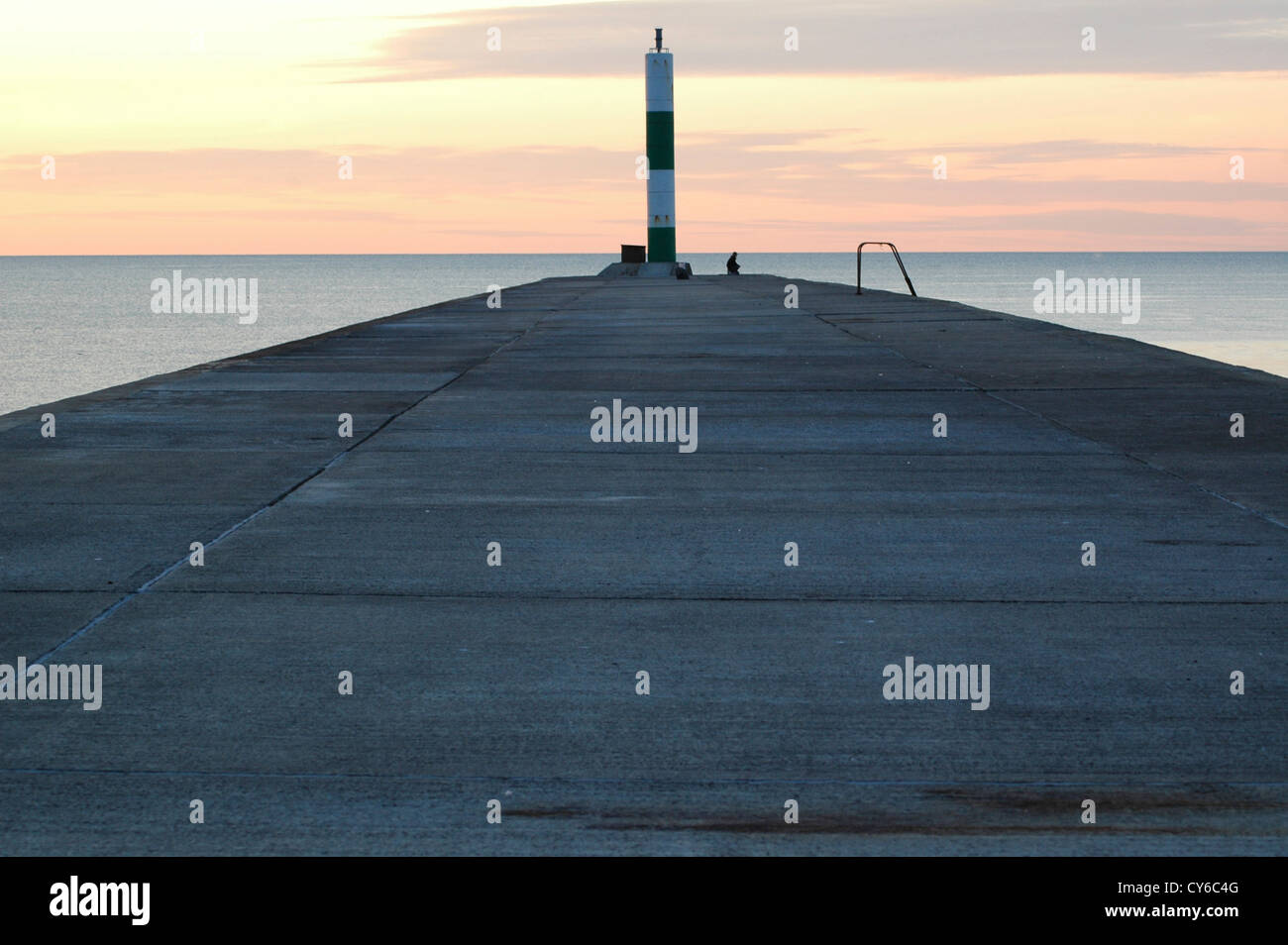 Aberystwyth stone jetty at sunset Stock Photo - Alamy