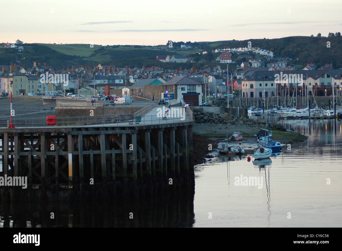 Aberystwyth harbour and marina as dusk approaches Stock Photo - Alamy
