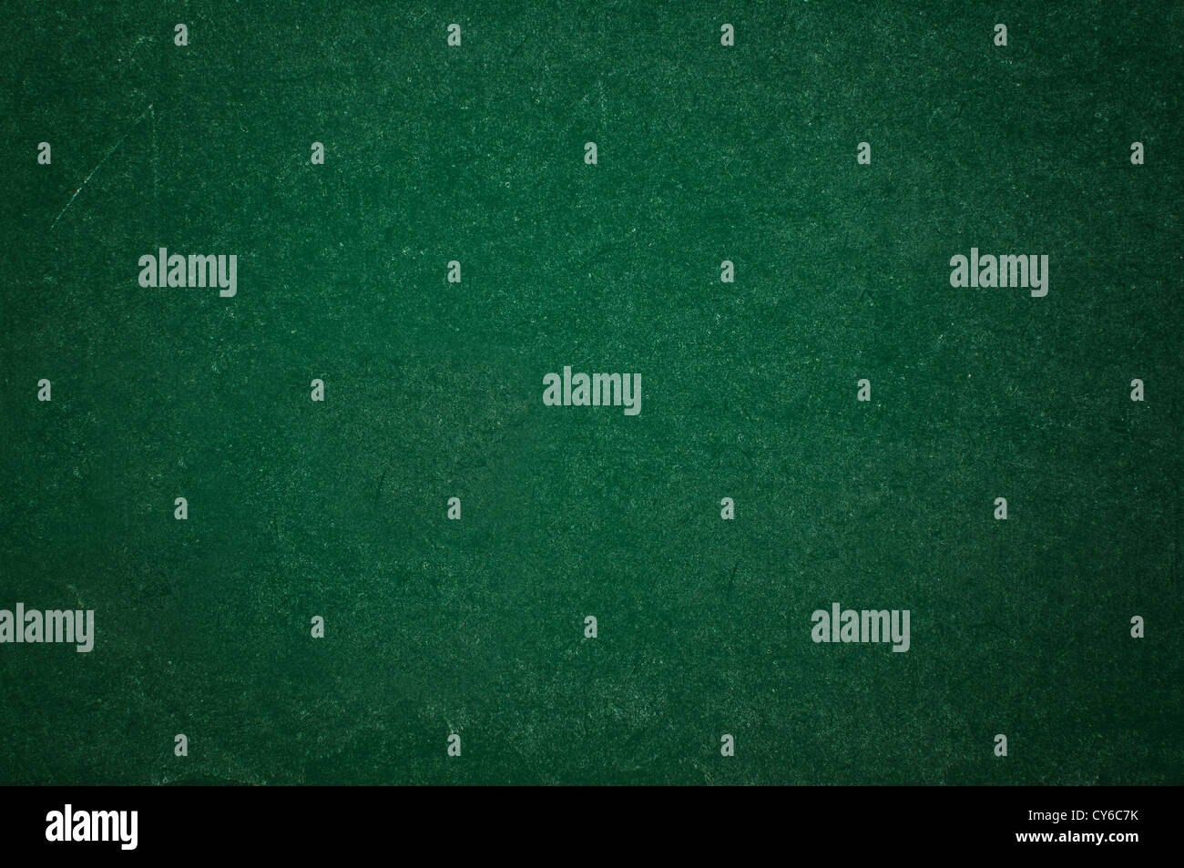Colorful chalks on grungy green chalkboard texture Stock Photo - Alamy