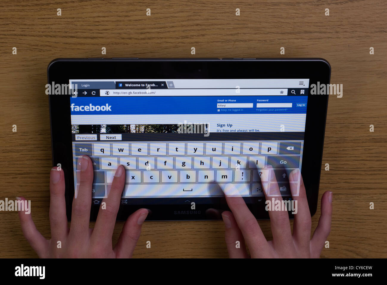 Typing on a Samsung Galaxy Tab Stock Photo - Alamy