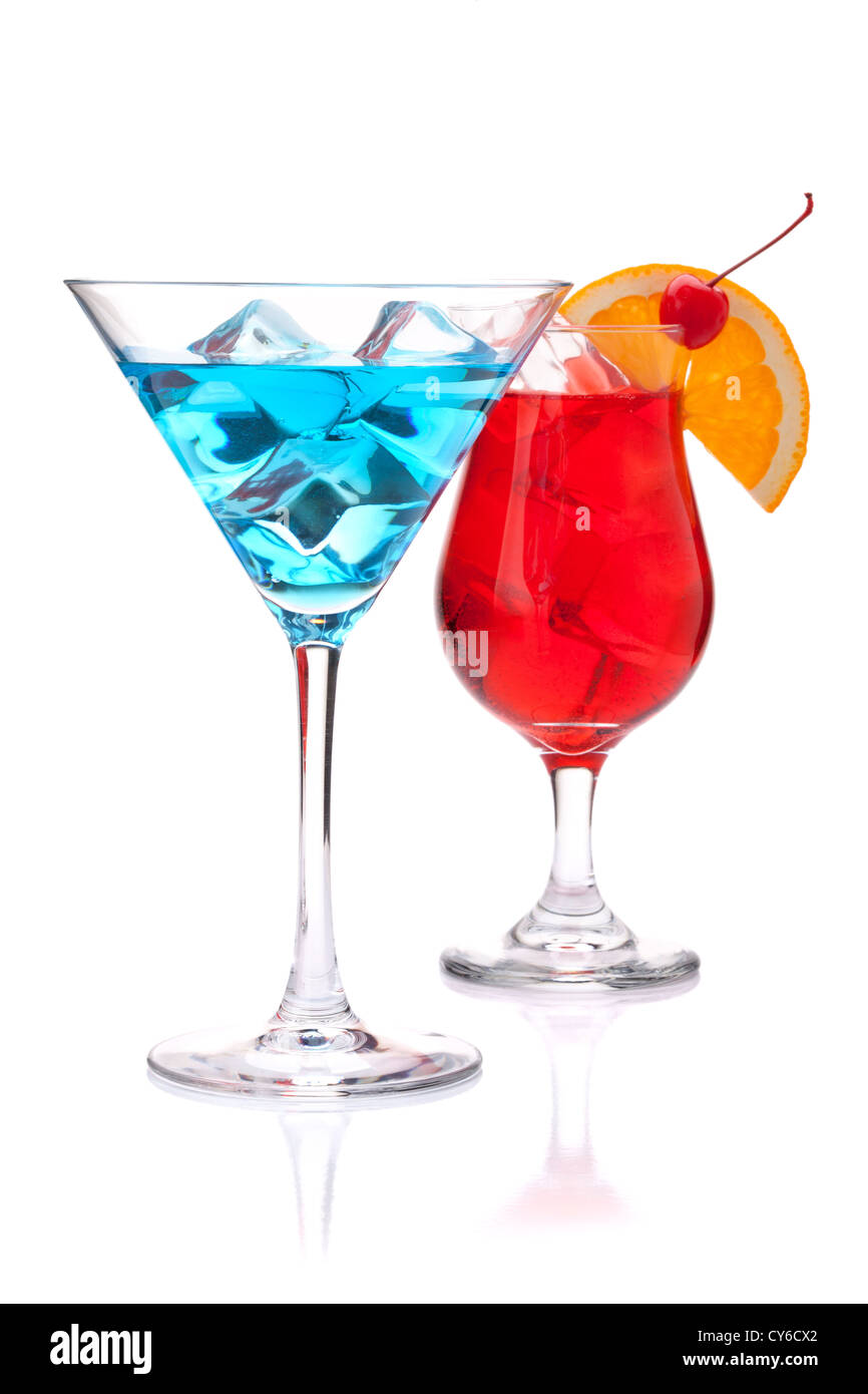 Two tropical cocktails: blue and red. Isolated on white background ...