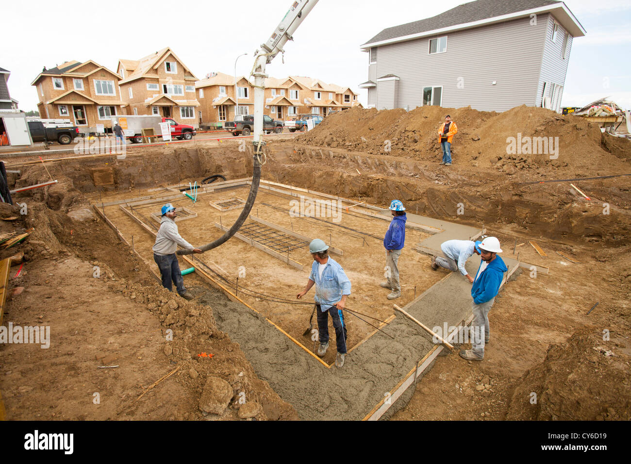 Construction Workers Rows New Houses High Resolution Stock Photography ...