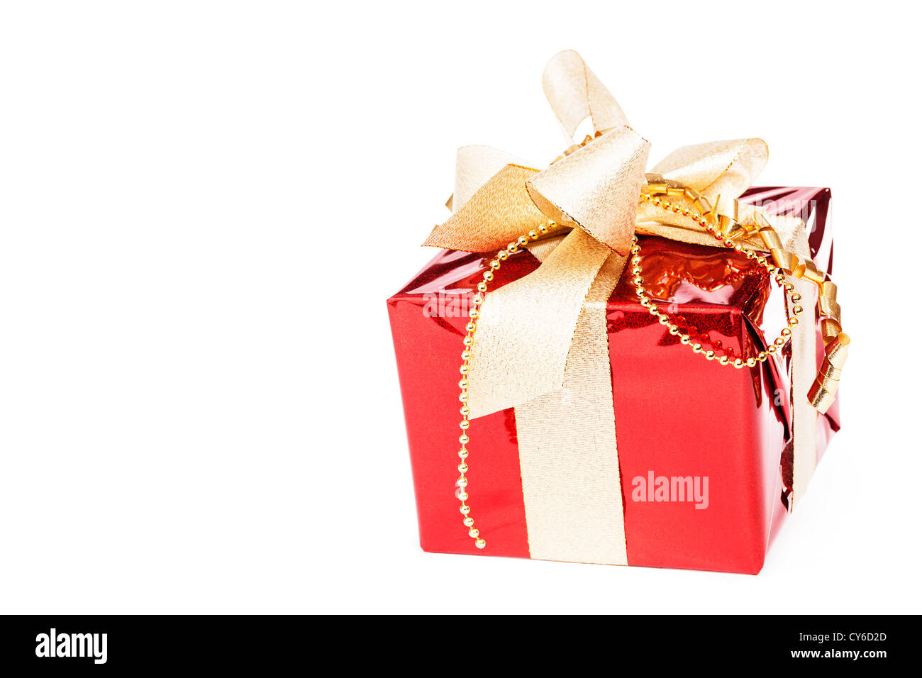 beautiful red christmas present with golden ribbons on white background ...