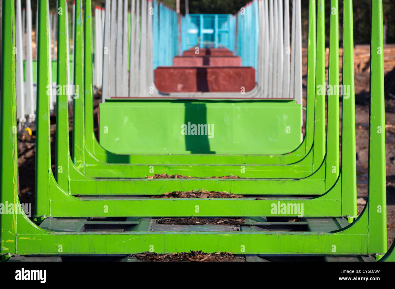 View of long empty cargo log train cars for transporting timber and ...