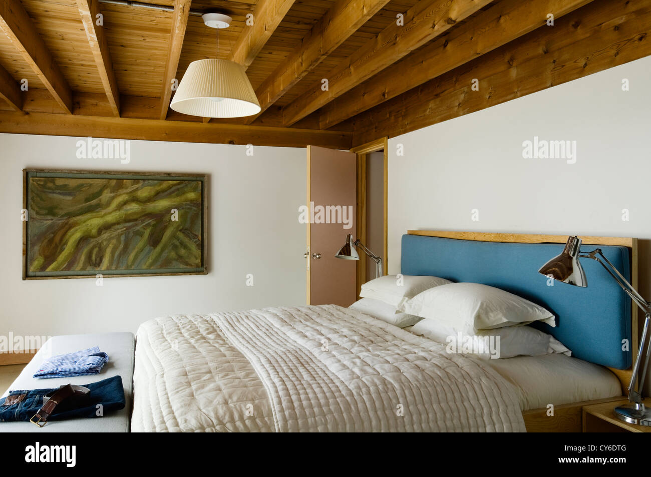 Bedroom with beamed wooden ceiling Stock Photo - Alamy