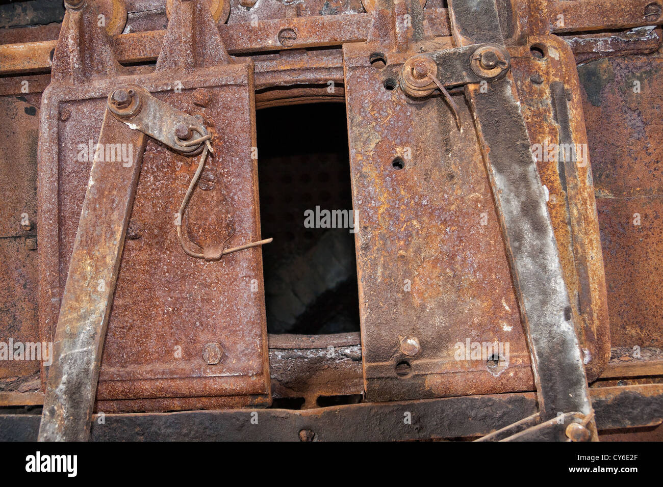 The door of the old rusty locomotive boiler Stock Photo - Alamy