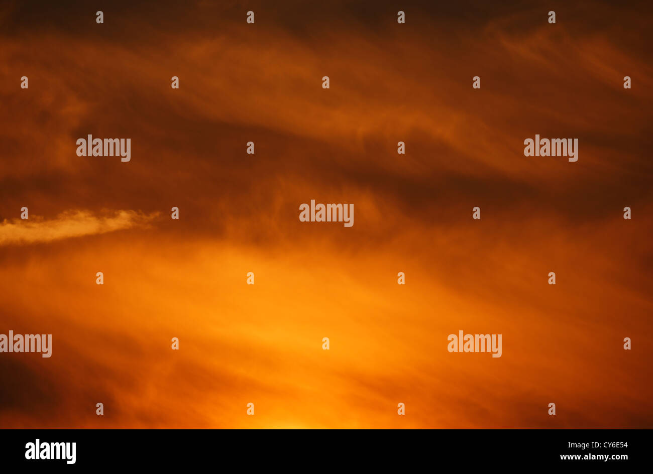 Moody, dusky, orange sunset sky Stock Photo - Alamy