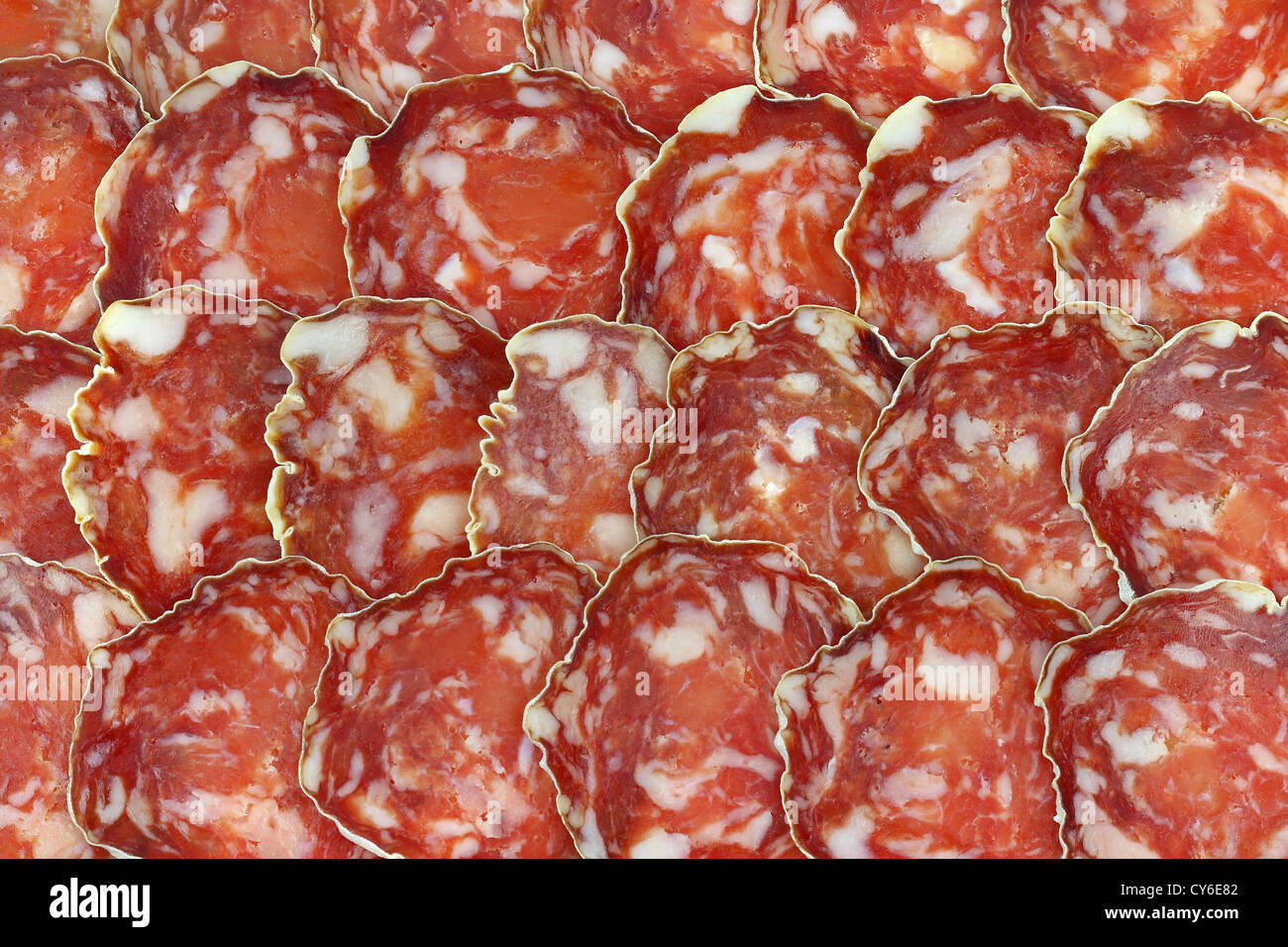 Italian salami background Stock Photo - Alamy