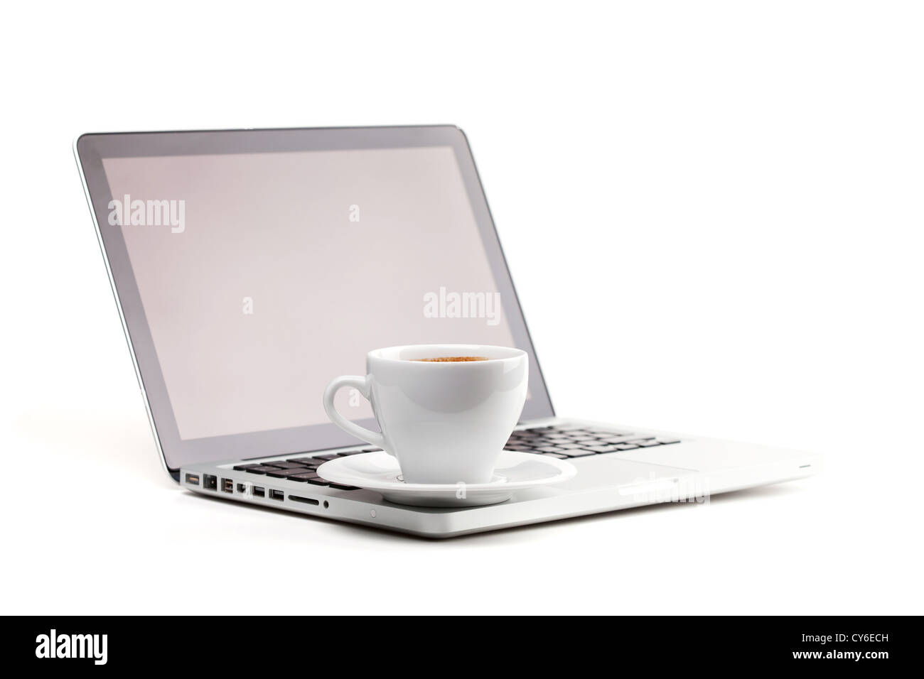 Cappuccino cup on laptop. Isolated on white background Stock Photo - Alamy