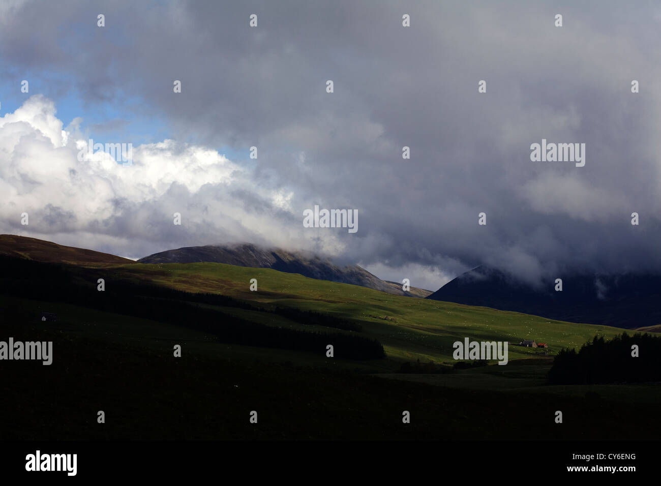 Storm clouds passing above Ben Vuirich Meall an Daimh and Ben Vrackie ...