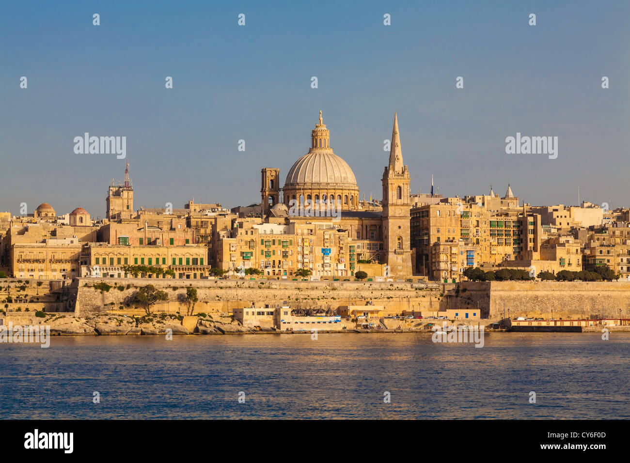 Skyline of the Maltese capital city Valletta in warm, late afternoon ...