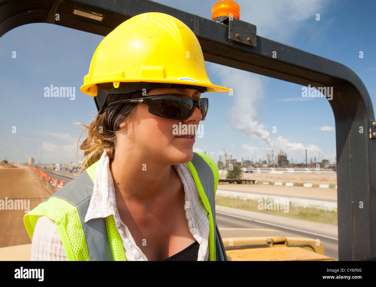 Ali Walker drives a large road rolling machine at the Syncrude Mildred ...